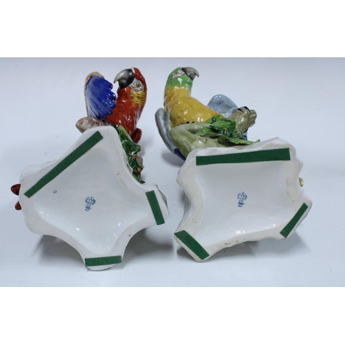 Two Sitzendorf parrots, taller 31cm, together with a blue and white ...