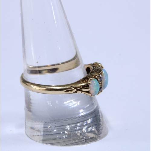 An early 20th century 18ct gold opal and diamond seven stone ring ...