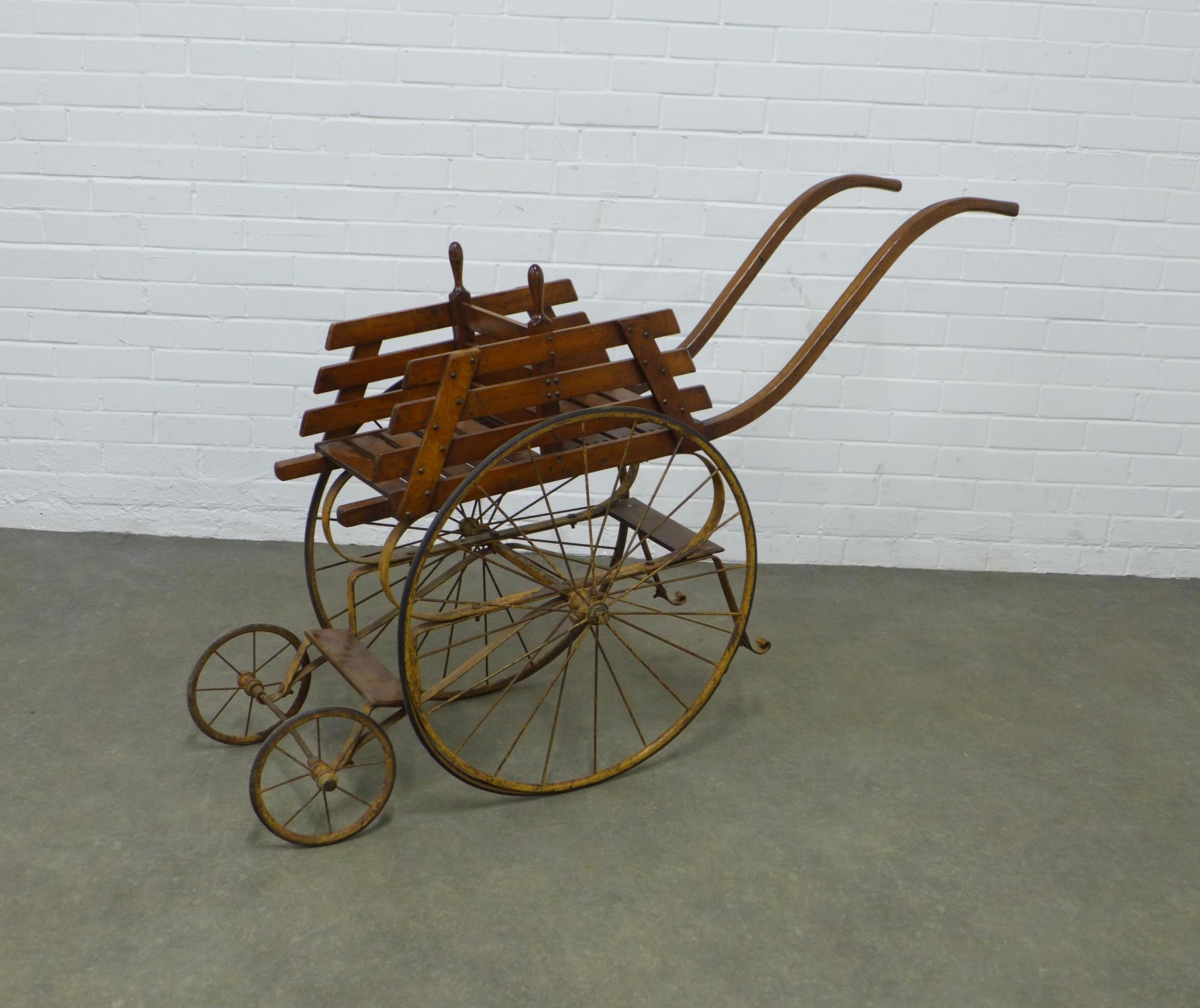 Late 19th / early 20th century child's cart, with slatted back to back ...