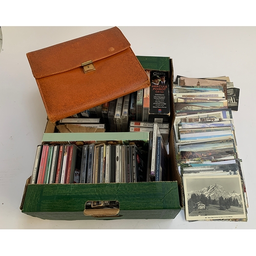A quantity of postcards; together with a collection of CDs and ...