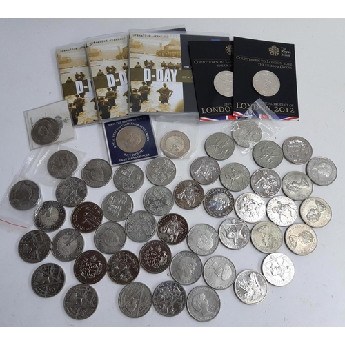 A large quantity of commemorative coins to include D-Day £5 coin ...
