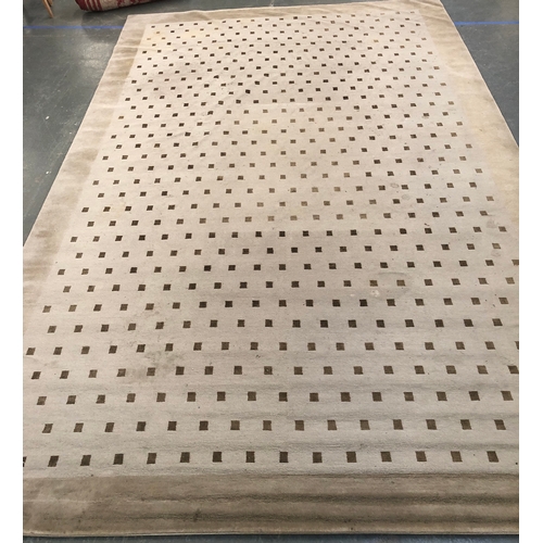 A very large wool rug by The Rug Company, 525x340