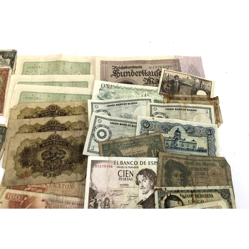A quantity of banknotes to include a George V ten shillings treasury ...