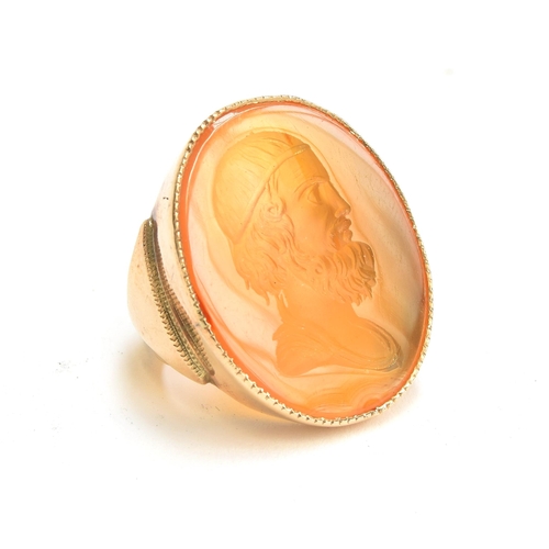 A 19th century gold mounted intaglio ring set with a carved carnelian ...