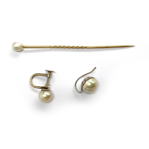 A Victorian gold and pearl stick pin, the pearl likely natural, the ...