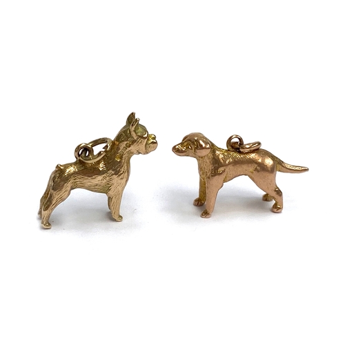Two 9ct gold dog charms: A 9ct gold boxer dog charm, 1.7cmH and a ...