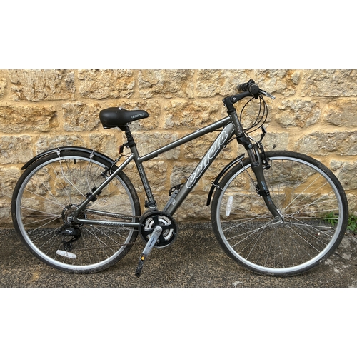 A Carrera Crossfire hybrid bicycle, with 3x7 Sram gears, Tektro brakes