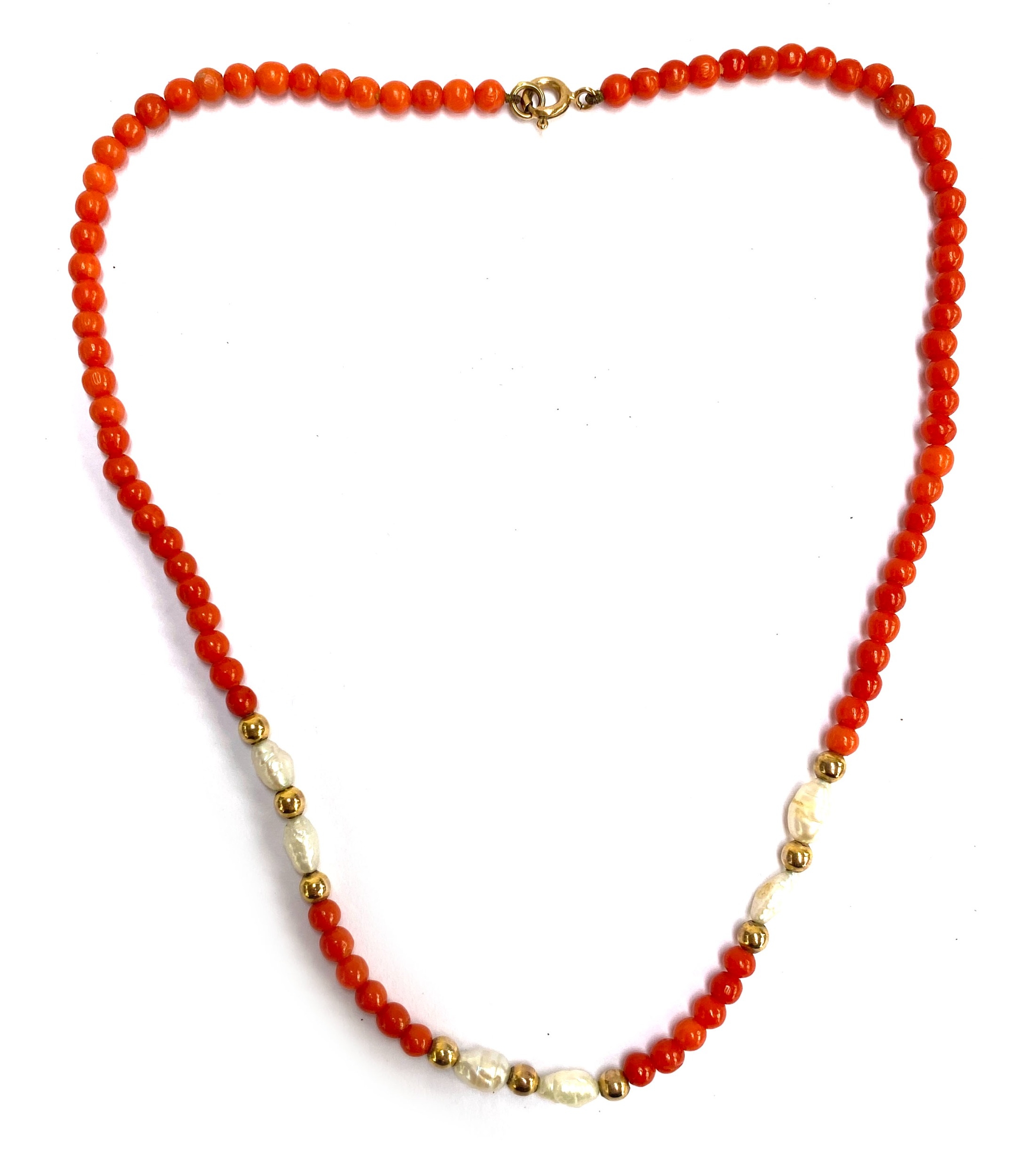A coral, pearl and gold bead necklace fastening with a 9ct gold bolt ...