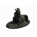 A late 19th/early 20th century bronze figure of a recumbent goat, 14.5cmL