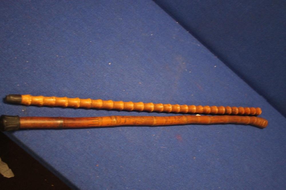TWO ANTIQUE JAPANESE WALKING CANES WITH TYPICAL DECORATION