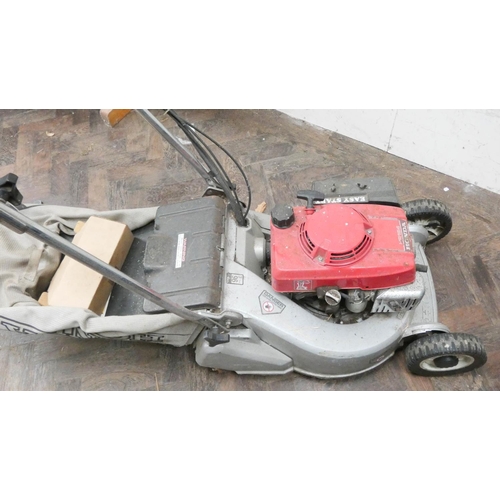 A Honda Easy Start self-propelled petrol engine lawn mower