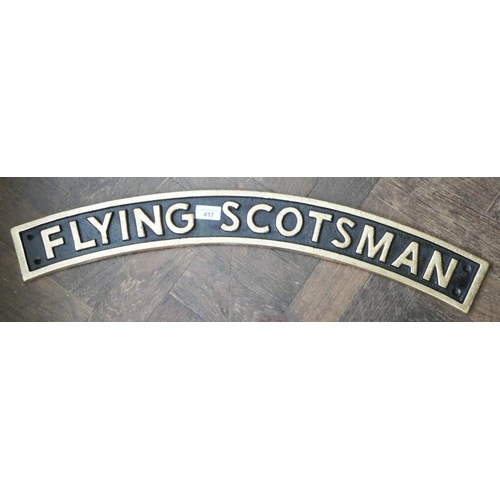 A curved Flying Scotsman cast iron railway sign