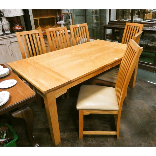 A good quality light oak dining table 6' x 3'3 together with six ...