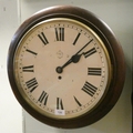 A circular RAF wall clock with fusee movement, dial is 14 1/2" diameter ...