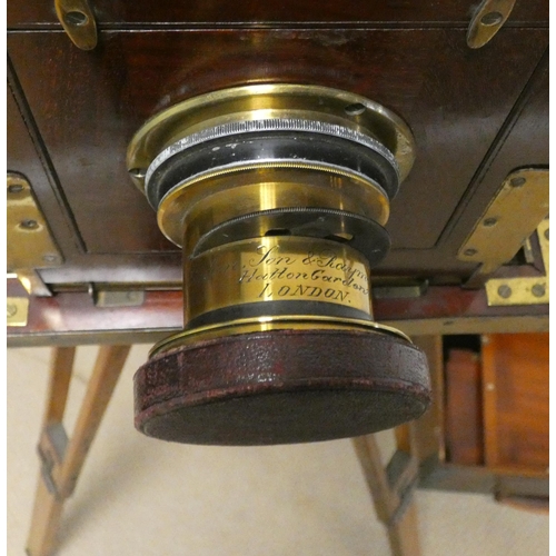 An Edwardian plate camera on mahogany tripod, lens signed Perken Son ...