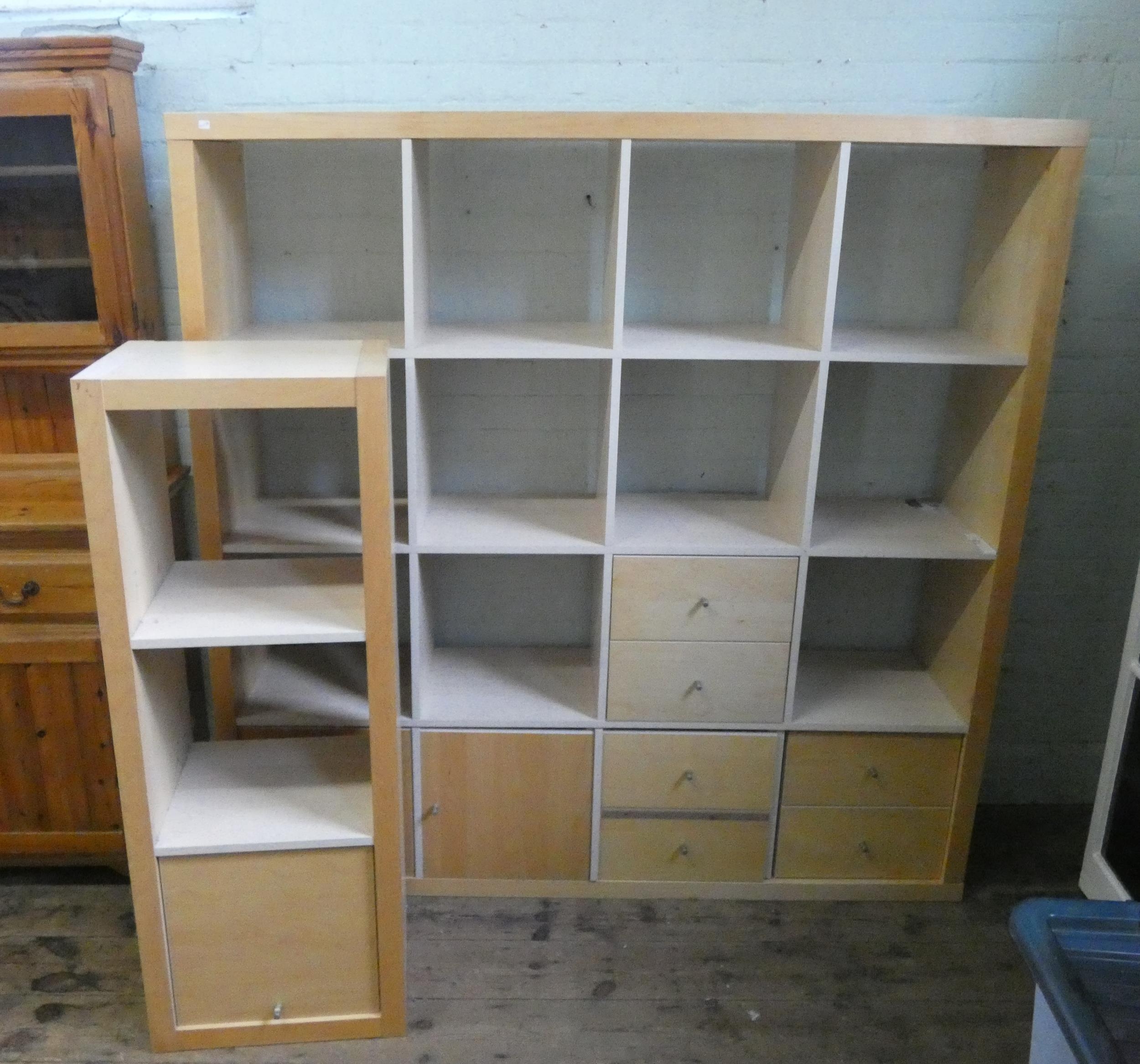 A large modern Pigeon hole shelf unit fitted drawers and cupboards and ...