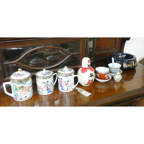 Three decorative Chinese cups with lids, two miniature cups and ashtray