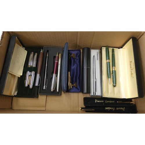 A large box of boxed pens, pen sets etc