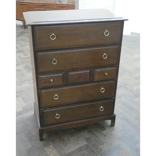 A Stag Minstrel mahogany tallboy chest of four long and three small ...
