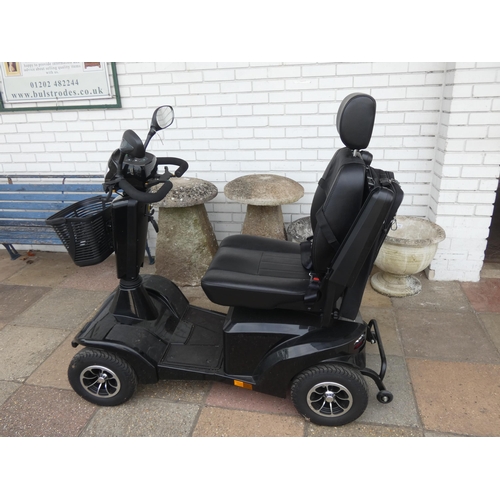 A Sterling S700 four wheeled large mobility scooter in very good ...