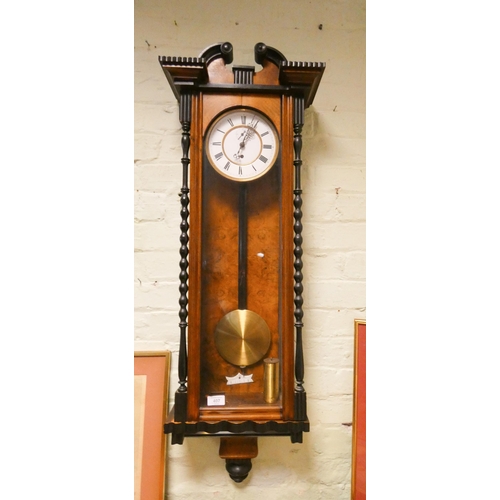 A Vienna Regulator wall clock