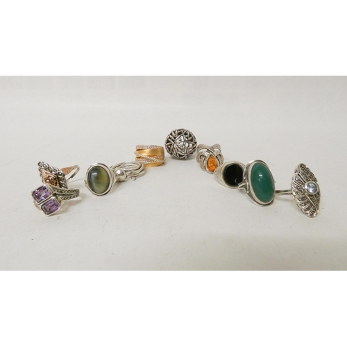 A collection of ten silver and silver gilt stone set rings