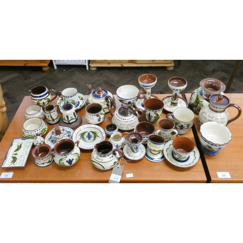 A quantity of assorted decorative Torquay and Devon Motto ware mixed ...