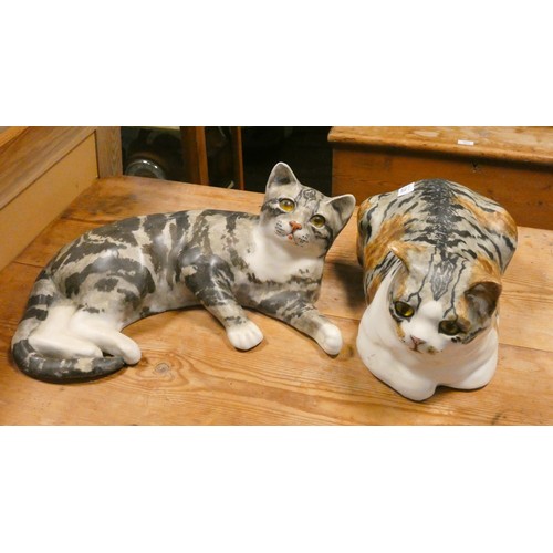 Two large Winstanley tabby cat figurines, both with glass eyes