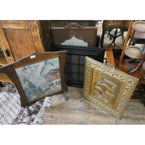 Three various fire screens and two plaques