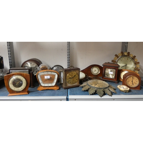 A large number of clocks of various shapes and sizes