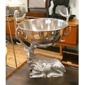 A polished aluminium stag ice bucket