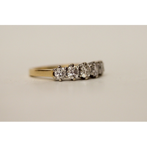A five stone diamond ring, claw set brilliant cut diamonds of ...
