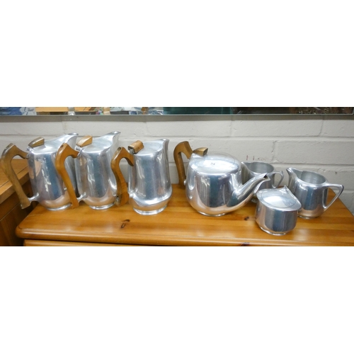 A collection of seven pieces of picquot ware