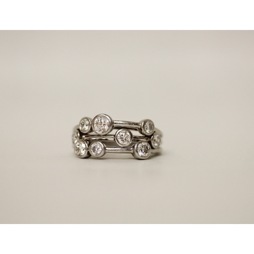 A Platinum Diamond ''Raindance'' Ring, by Boodles, nine round brilliant ...