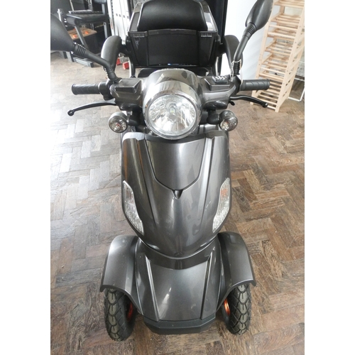 A grey and black good quality Green Power mobility scooter with charger ...