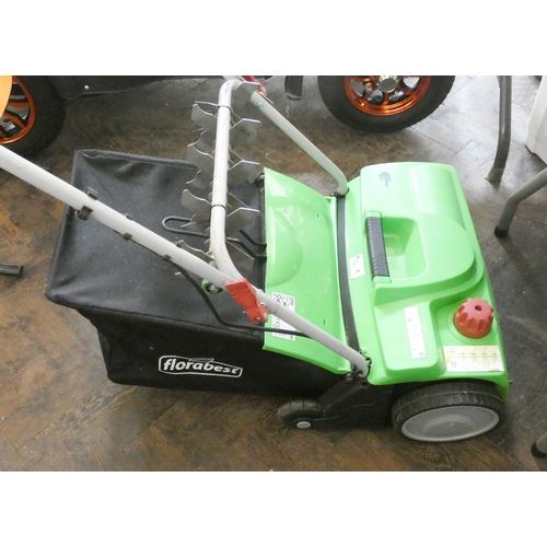 A Florabest garden scarifier/lawn aerator
