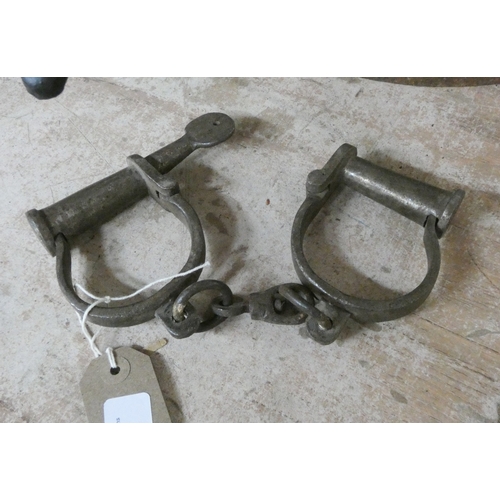 A pair of old handcuffs