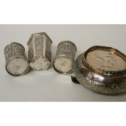 Chinese silver cruet set and a white metal ashtray. 4.8 troy oz