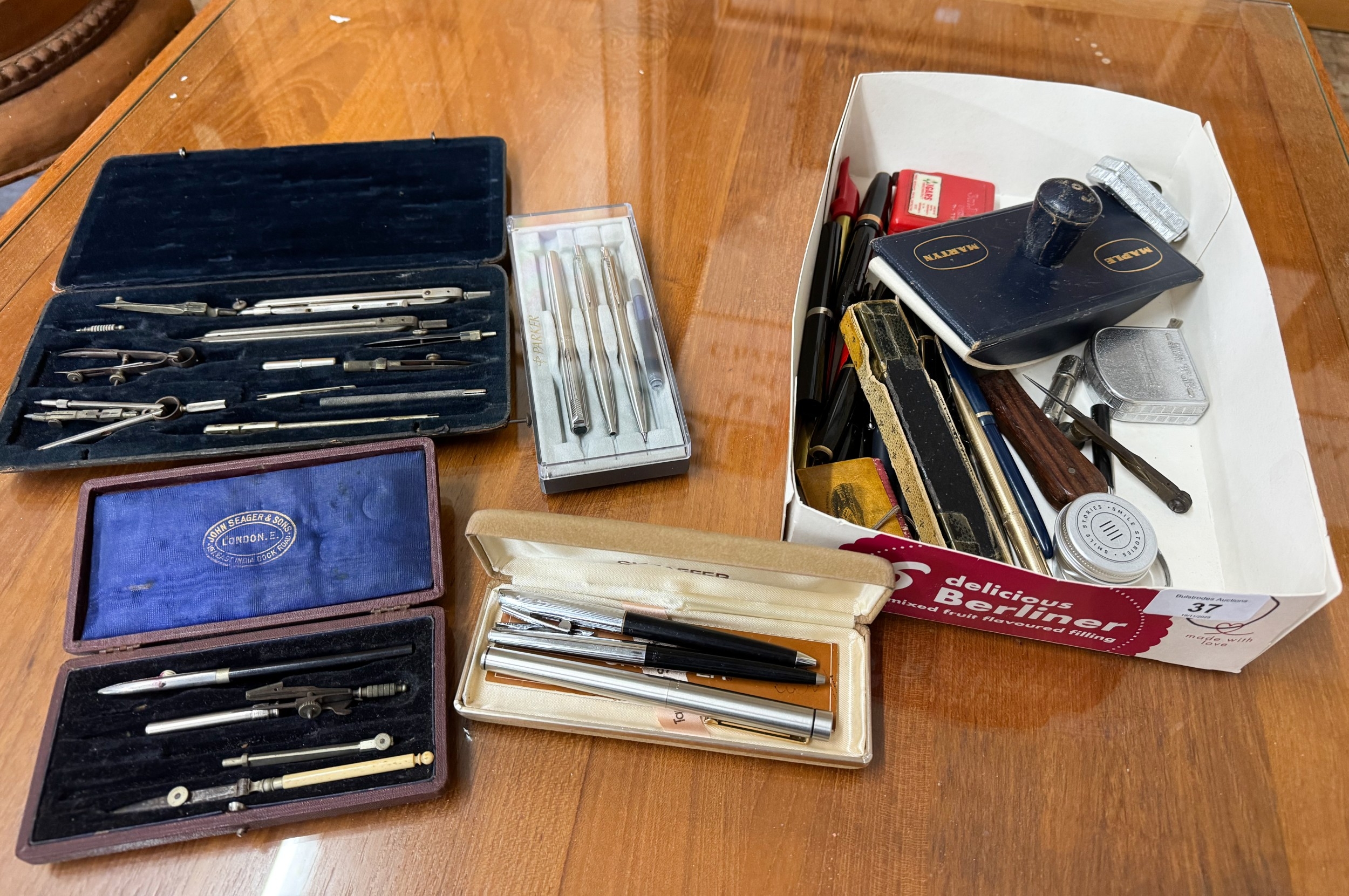 Assorted pens, pen and pencil set, drawing instruments, tape measure etc