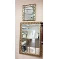 A large rectangular gilt framed wall mirror and a smaller vintage wall ...