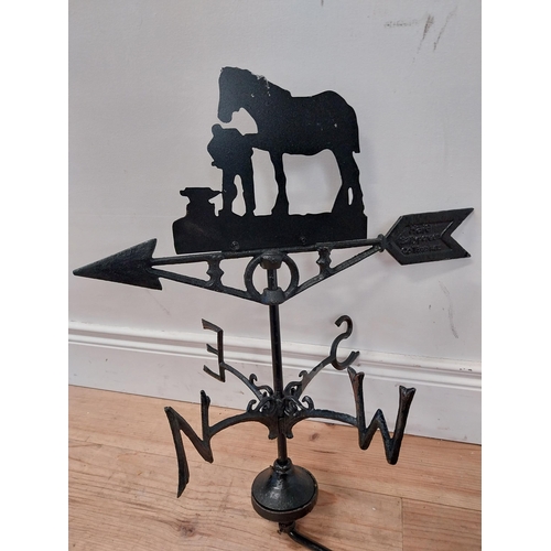 Cast iron wall mounted weather vane {55cm H x 60cm W x 34cm D}