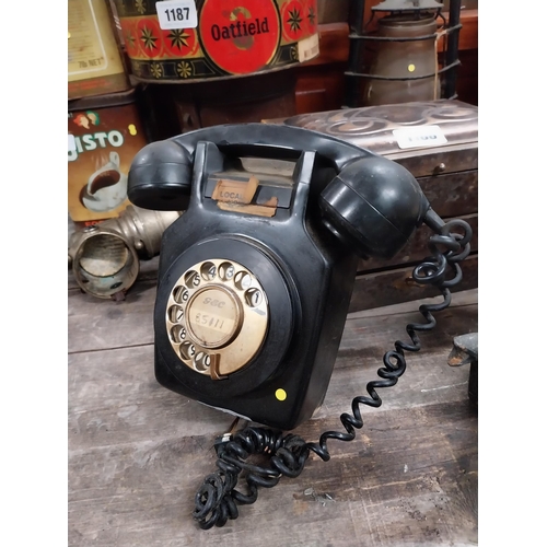 1950s Bakelite wall telephone {22 cm H x 23 cm W}.