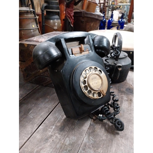 1950s Bakelite wall telephone {22 cm H x 23 cm W}.
