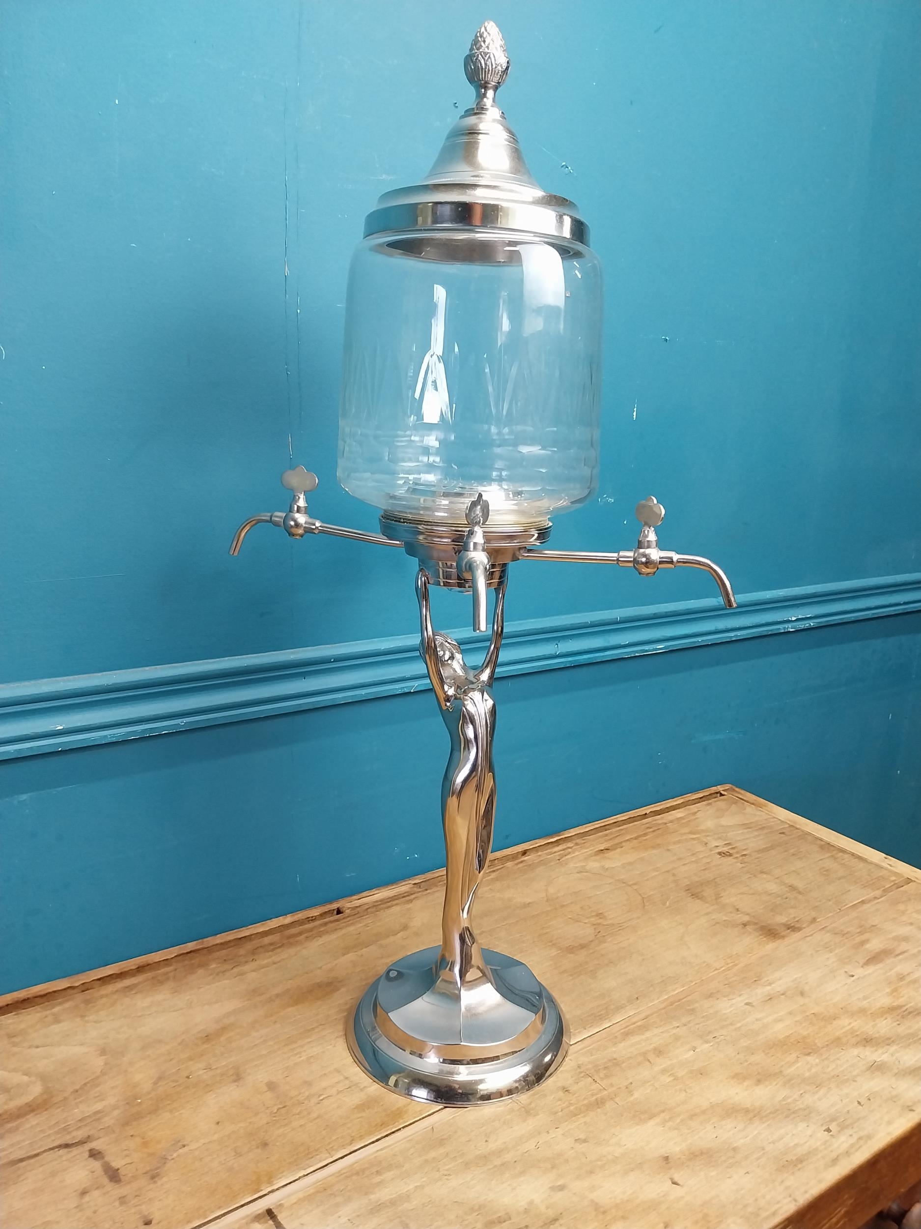 Art Deco Silver plate and glass four tap Absinthe dispenser {}.