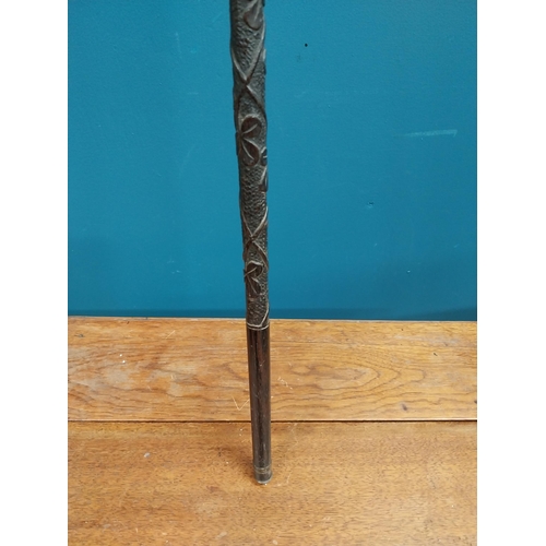 19th C. bog oak walking stick decorated with shamrocks. {94 cm H x 12 cm W}