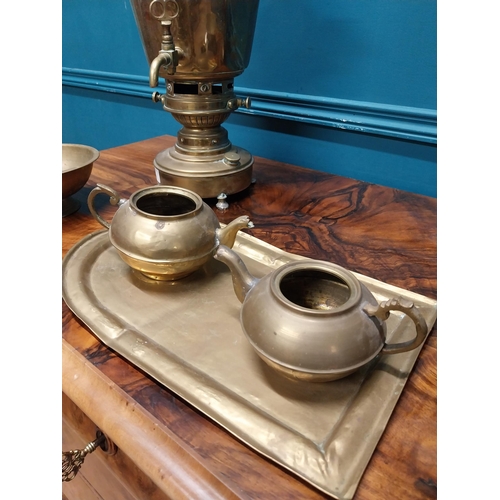 Two 19th C. brass samovars, two bowls, two teapots and tray. {47 cm H x ...
