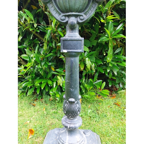 Cast alloy free standing post box.