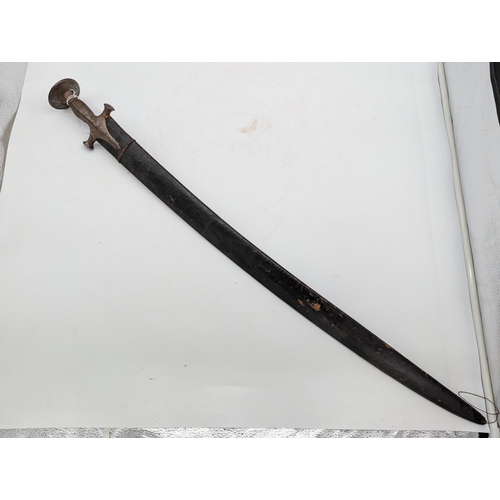 19th C. Middle Eastern sword in scabbard {9cm W x 89cm L}