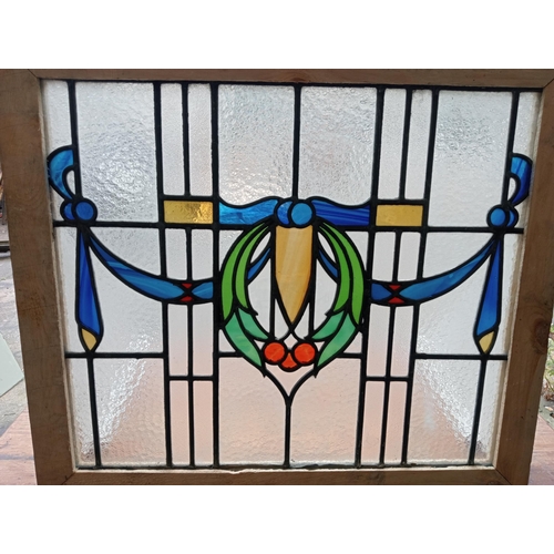 Victorian stain glass window red flower and blue bow design ...