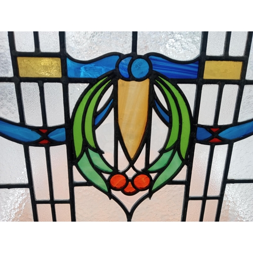 Victorian stain glass window red flower and blue bow design ...